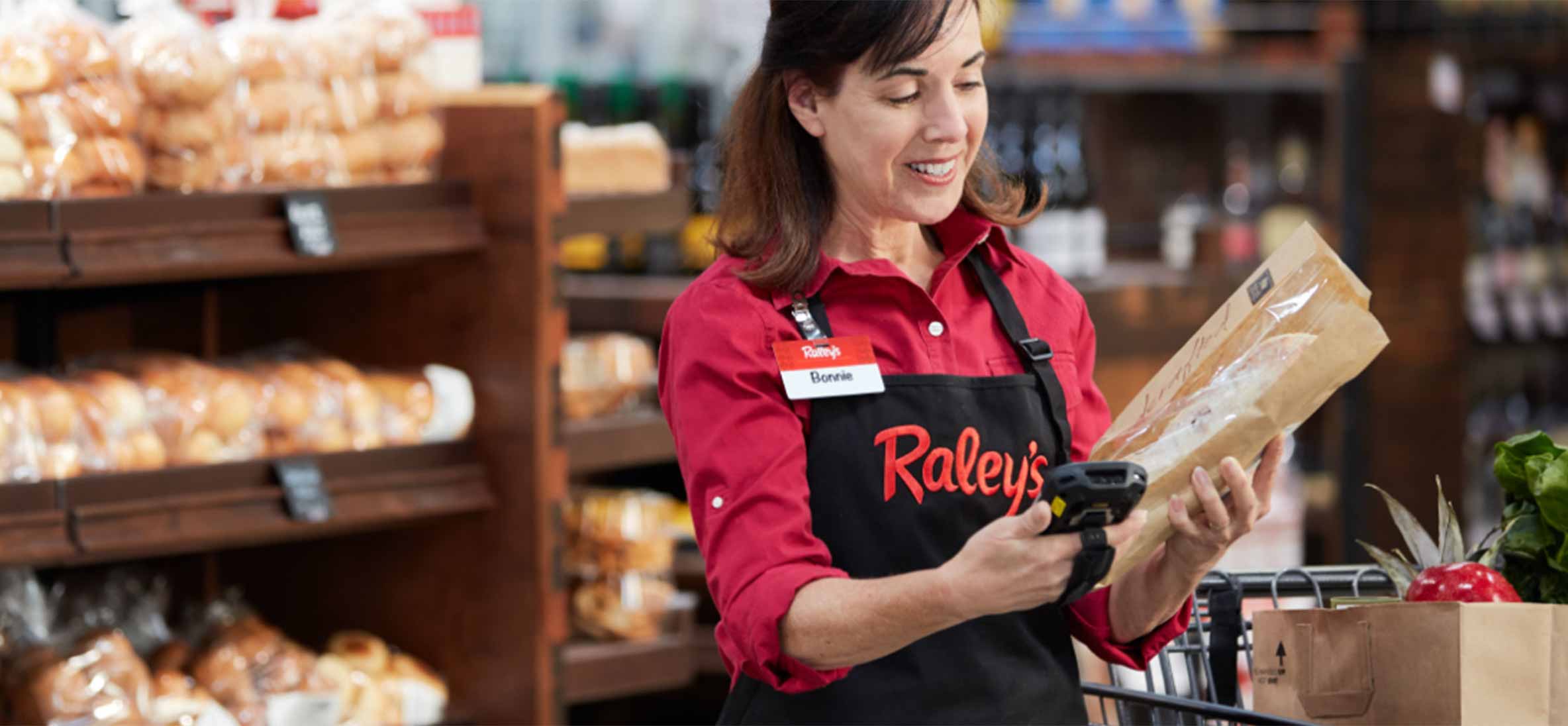 image contains a person picking items for an online order